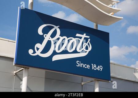 Boots storefront signage Stock Photo - Alamy