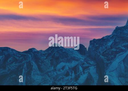 Silhouette of mountain ridge against sunset sky Stock Photo - Alamy