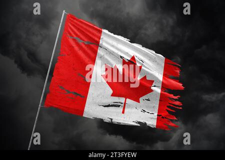 Canada torn flag on dark sky background with blood stains Stock Photo ...