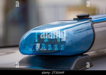 Symbol image police operation: Close up of a blue light on a police car ...