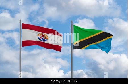 Tanzania and French Polynesia flags waving together on blue cloudy sky, two country relationship ...