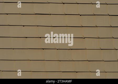 Brown texture of lamellar tiles on the roof. Texture and backgrounds ...