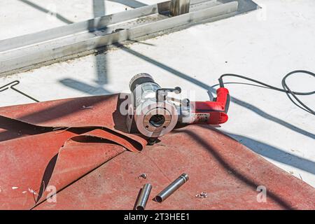 A tube facing and squaring tool is used on stainless steel tubing used ...