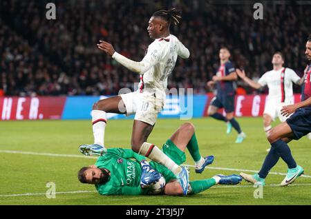 PSG's goalkeeper Gianluigi Donnarumma saves a shot from Arsenal's ...