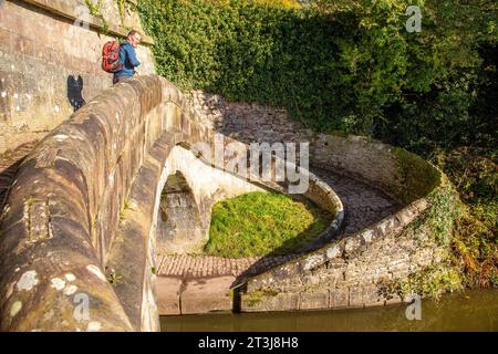 Stone snake bridge on the Macclesfield canal in the Cheshire ...