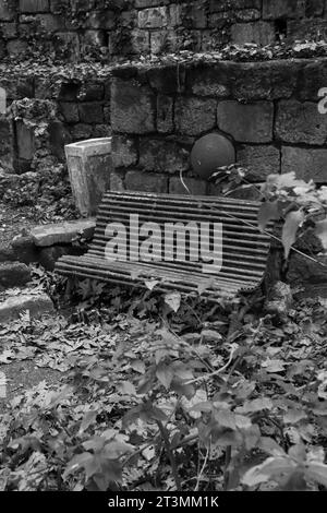 White metal bench with no people on the street Stock Photo - Alamy