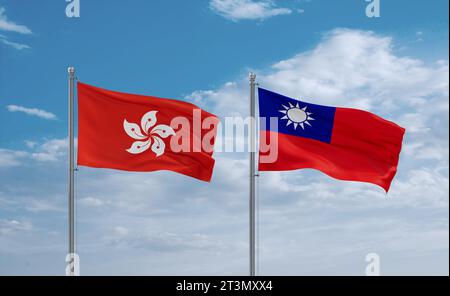 Hong Kong and Taiwan flags waving together on blue cloudy sky, two ...