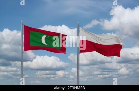 Maldives and Poland flags waving together on blue cloudy sky, two country relationship concept ...