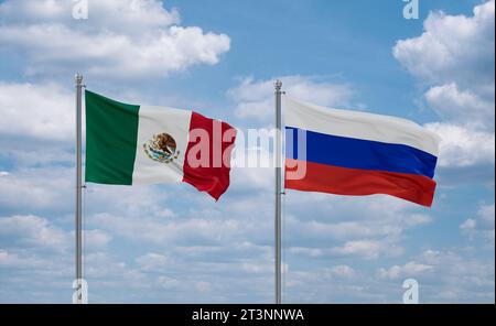 Russian Federation and Mexico flag waving together in the wind on blue ...
