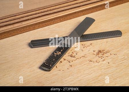 wood rasp files against okoume plywood - woodworking concept Stock ...