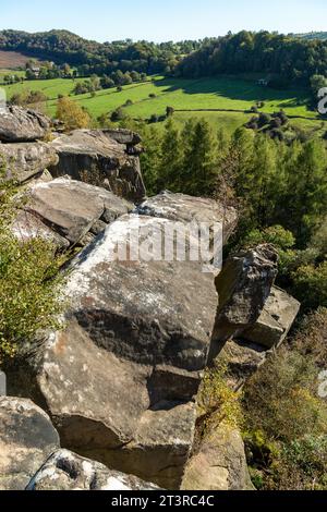Cratcliffe Tor a rock outcrop near Robin Hoods Stride and the village ...