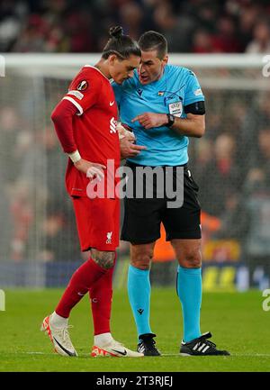 Liverpool's Darwin Nunez speaks to referee Rade Obrenovic at half-time ...