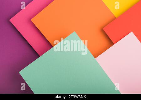 Top view of colorful paper sheets on the table - great for wallpapers ...