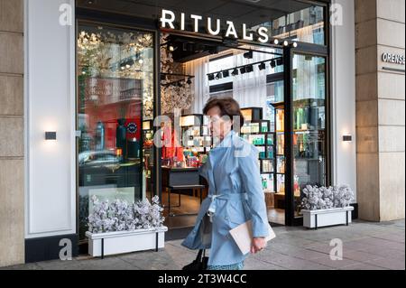 A pedestrian walks past the Dutch cosmetics brand Rituals store in ...