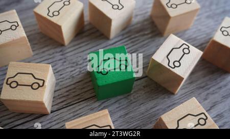 Wooden blocks with symbol of transportation concept on blue background ...