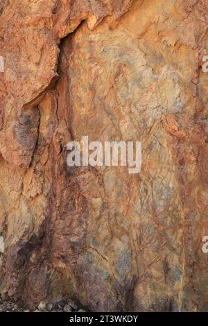 Colorful volcanic rock textures and minerals of a mountain in ...