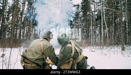 Mortar Shooting Explosions. Back View On Re-enactors Dressed As ...