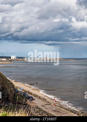 Beaches and cliffs at Sunderland, UK with view to Sunderland docks ...