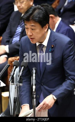 Japanese Defense Minister Minoru Kihara (front L) holds talks with U.S ...