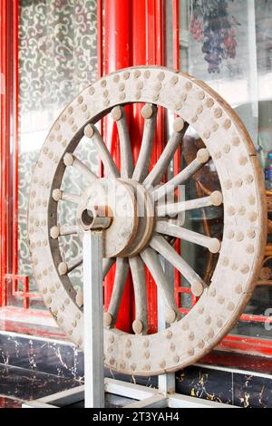 traditional Chinese style wooden wheels in a park Stock Photo - Alamy