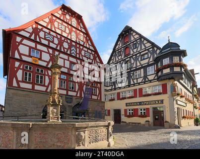 Markplatz with traditional houses and fountain on the foreground ...