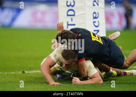 England’s Theo Dan scores his sides second try during the Rugby World ...