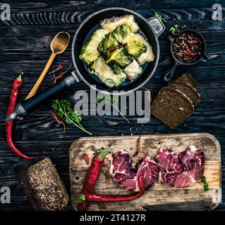 Juicy meat rolls cooking on metal skewers over hot charcoal with ...