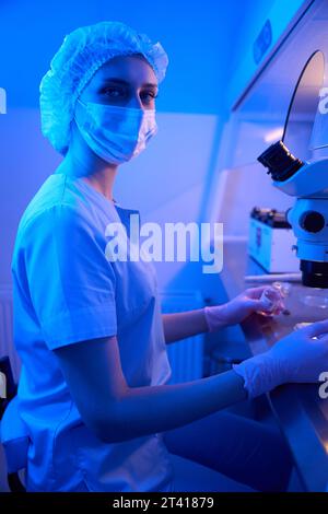 Lab researcher is posing for camera in her workplace Stock Photo - Alamy