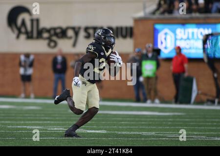 Wake Forest running back Demond Claiborne (23) runs for a touchdown ...