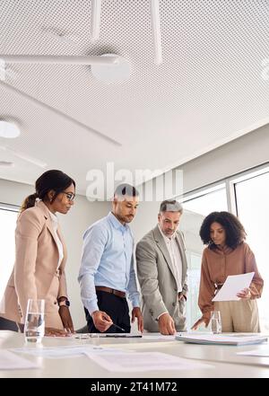 Business team working on their project together at office Stock Photo ...