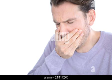 Man feeling sick and nauseous. White background Stock Photo - Alamy