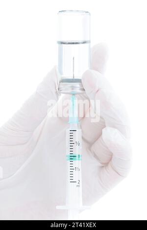 Doctor preparing syringe for injection Stock Photo - Alamy