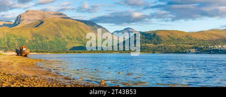 The Old Boat of Caol shipwreck lies upon the stony beach of Corpach of ...
