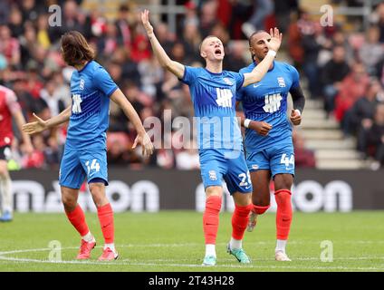 Birmingham City's Jay Stansfield (centre) celebrates scoring his sides ...