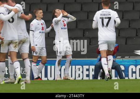 Max Dean celebrates after scoring for Milton Keynes Dons, to take the ...