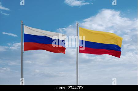 Colombia and Russia flag waving together in the wind on blue sky, two ...