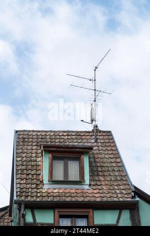 Old antenna on the window. Concept of catching a TV signal. Vintage ...