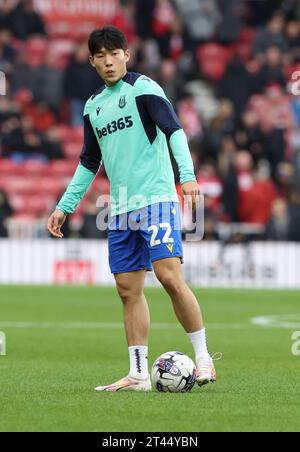 #10, Bae Jun-Ho of Stoke City moves to intercept as #7, Tatsuhiro ...