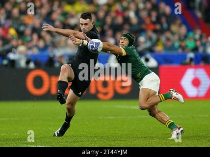 New Zealand's Will Jordan (left) and Scotland's Rory Darge in action ...