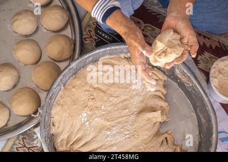 Turkish woman making bread out of dough. Hatay Turkey Stock Photo - Alamy