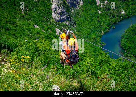 Women Enjoying Thrilling Zipline Experience, Embracing the Exhilaration ...