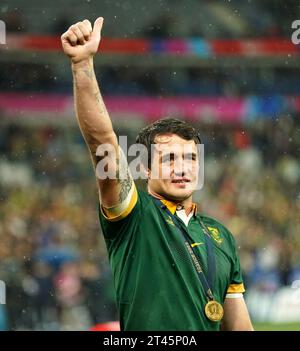 South Africa's Franco Mostert celebrates scoring their side's first try ...