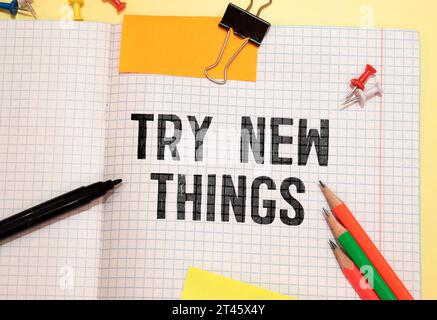 Try new things text on yellow background cover. Try new things concept ...