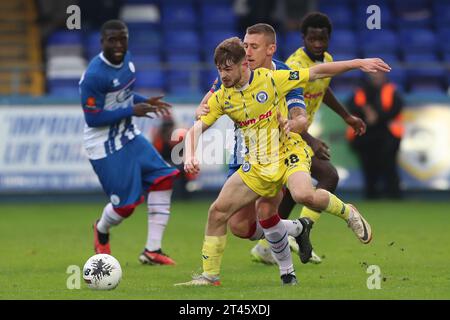 David Ferguson of Hartlepool United battles with Levi Lumeka of Oxford ...