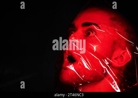 Person Trapped in Black Plastic Bag. Concept of Horror Movie Scene ...