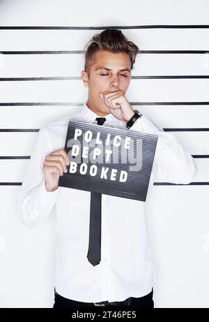 Crime, mugshot and man on a white background for suspect for criminal ...