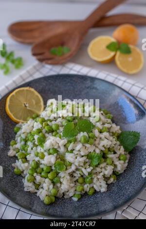 Italian risotto with pancetta, parmesan and parsley in a pan Stock ...