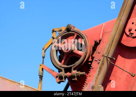 Beam pumping unit rotating wheels, closeup of photo Stock Photo - Alamy