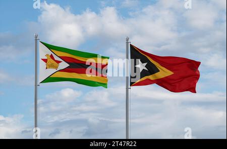 East Timor and Zimbabwe two flags textile cloth, fabric texture Stock ...
