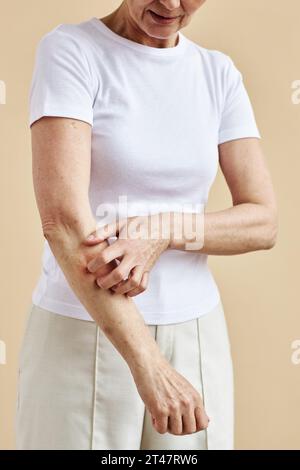 Woman with anxiety, hands scratch skin and stressed self harm picking ...